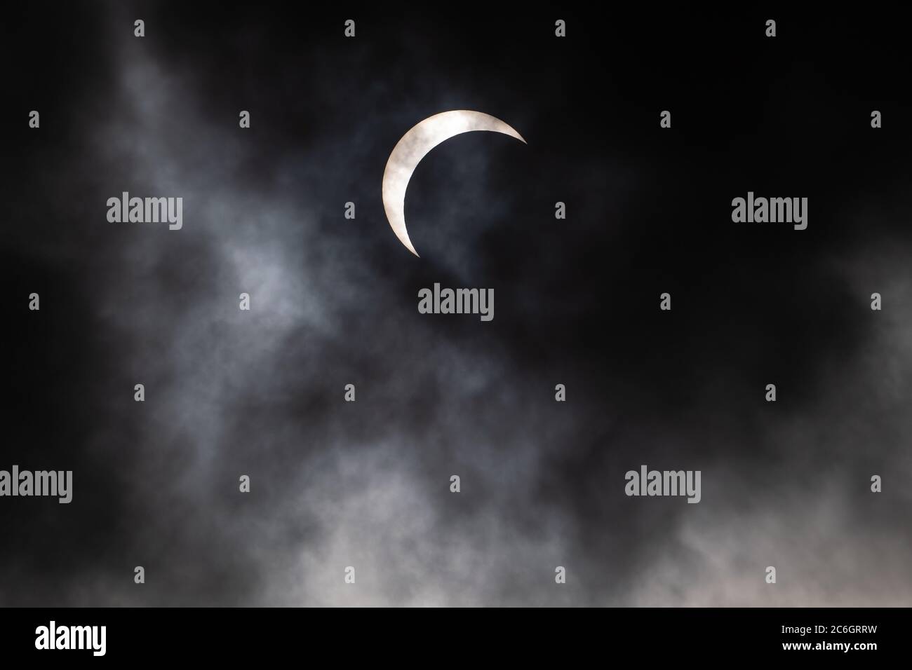 A solar eclipse is captured in Guangzhou city, east China's Guangdong ...
