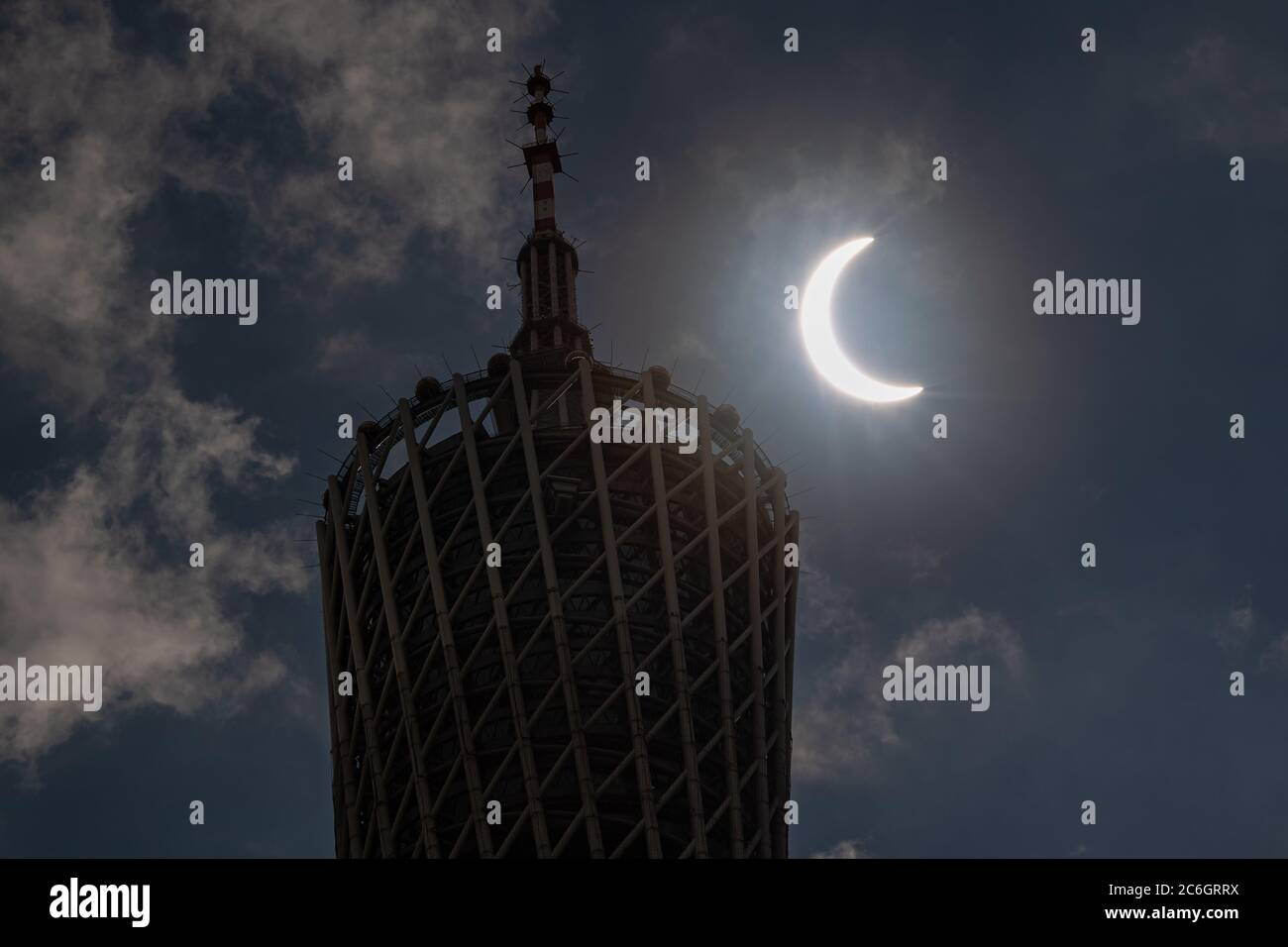 A solar eclipse is captured in Guangzhou city, east China's Guangdong ...