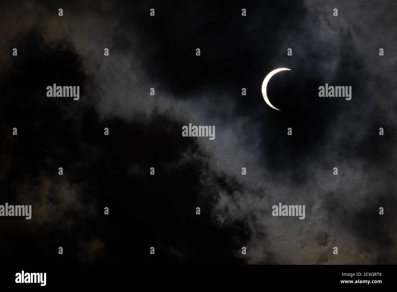 A solar eclipse is captured in Guangzhou city, east China's Guangdong ...