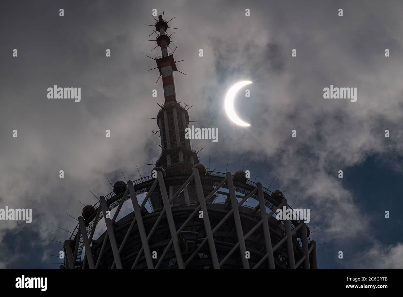 A solar eclipse is captured in Guangzhou city, east China's Guangdong ...