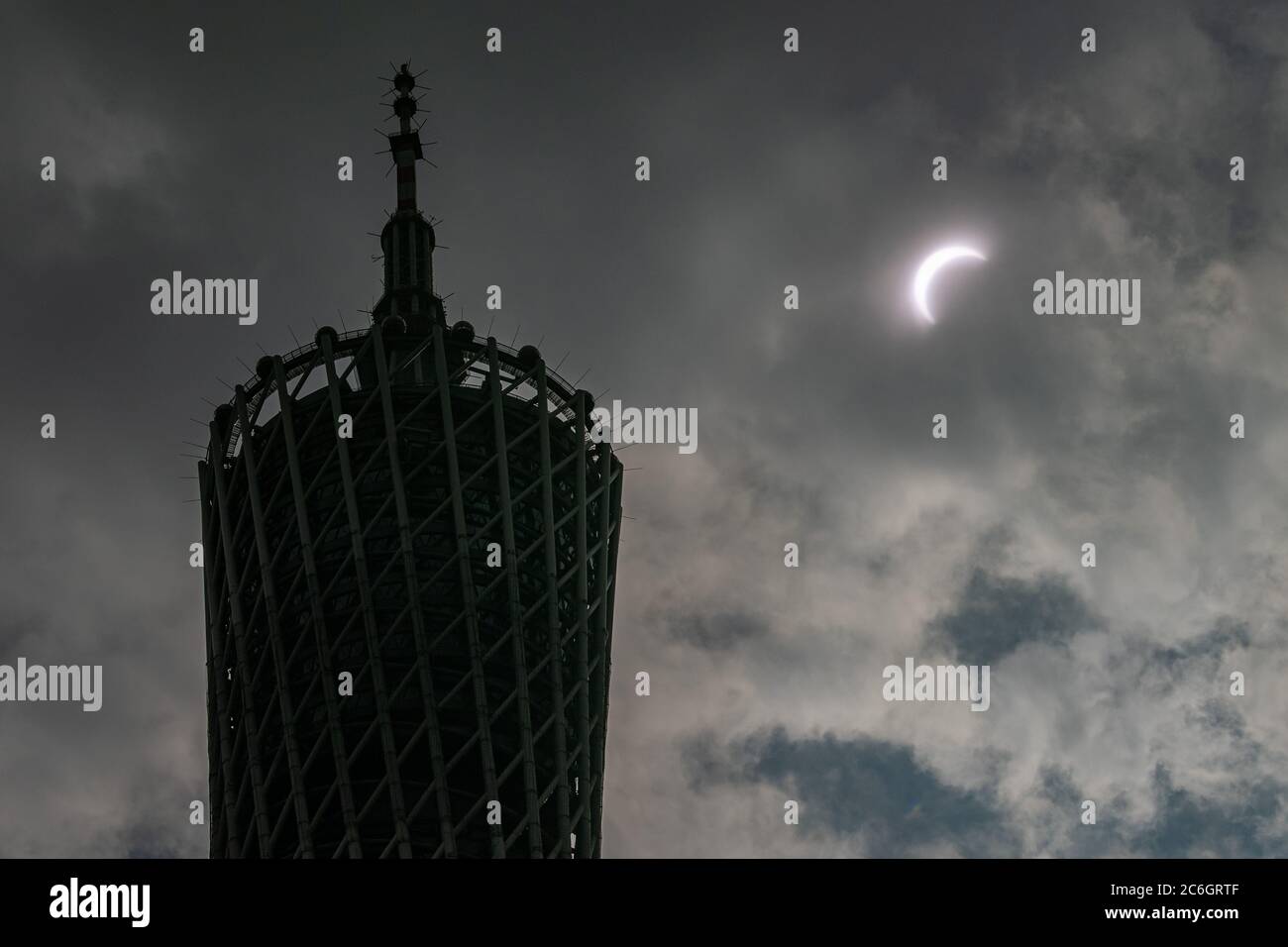 A solar eclipse is captured in Guangzhou city, east China's Guangdong ...