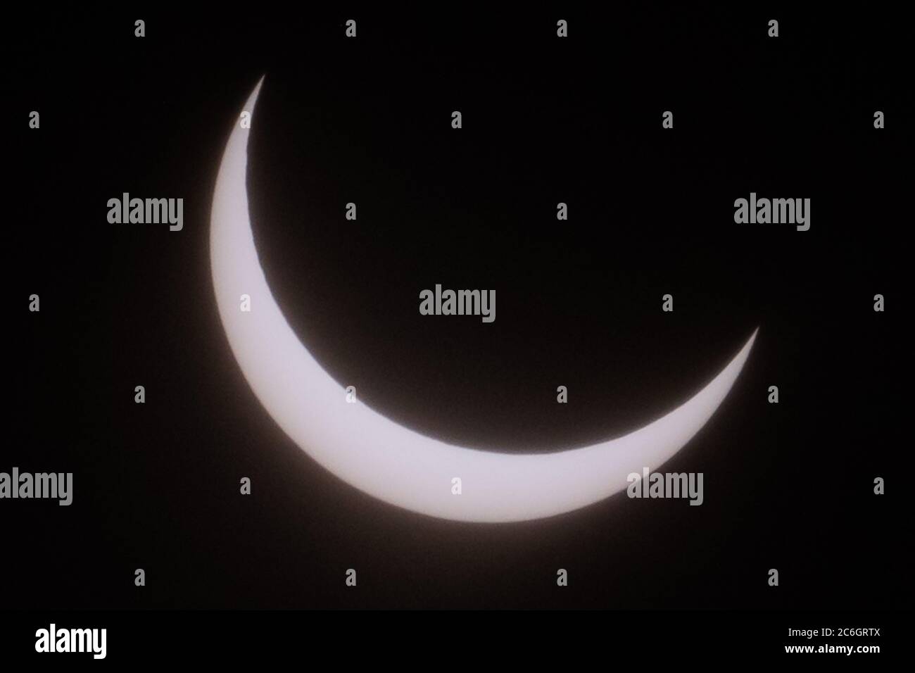 A solar eclipse is captured in Guangzhou city, east China's Guangdong ...