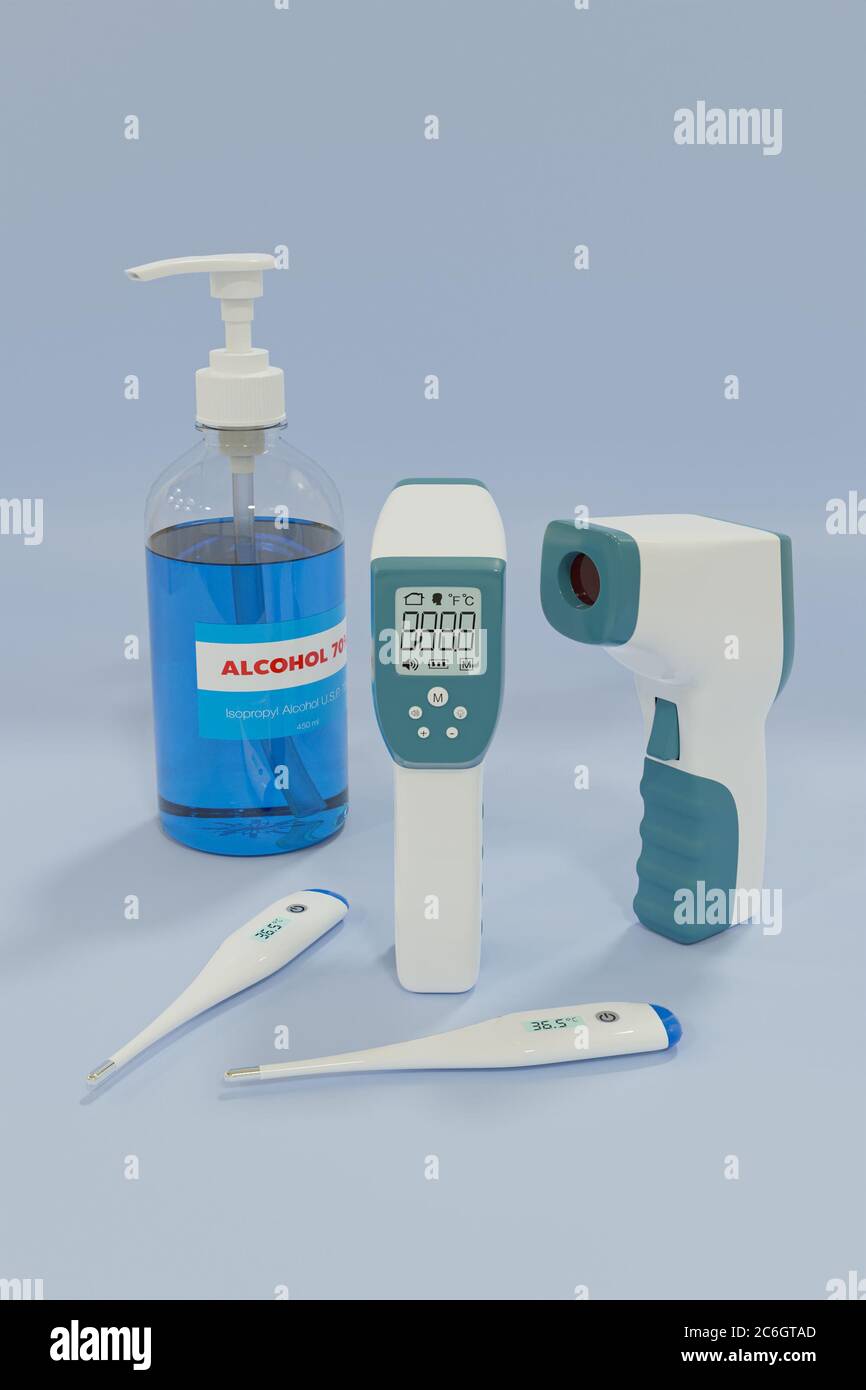 Digital thermometers and alcohol bottle Stock Photo - Alamy