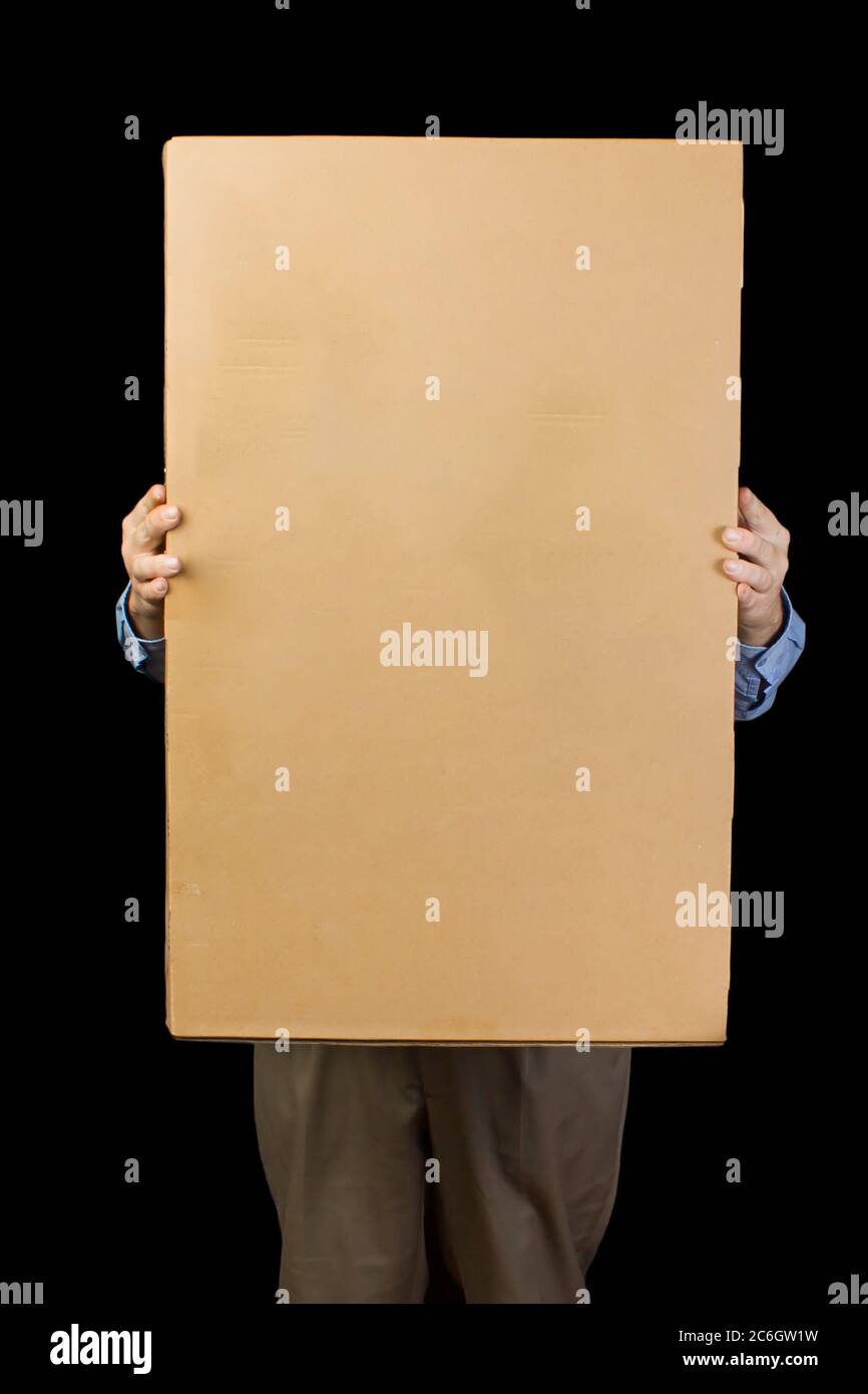 The man holding in his hand a cardboard box. covers her whole body ...