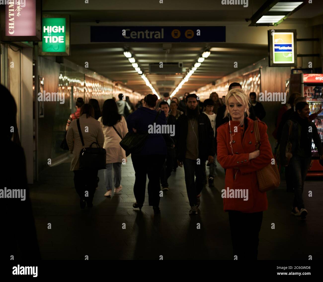 Street photography. People commuting to or from the trains through the ...