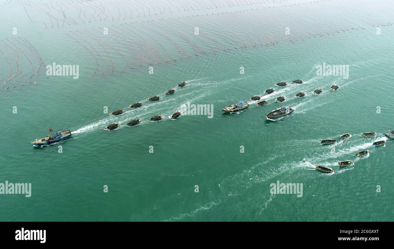 Chinese fishing boats fleet hi-res stock photography and images - Alamy