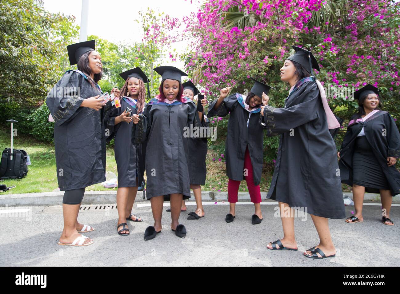 South African students pose for graduation photos at the Chongqing ...