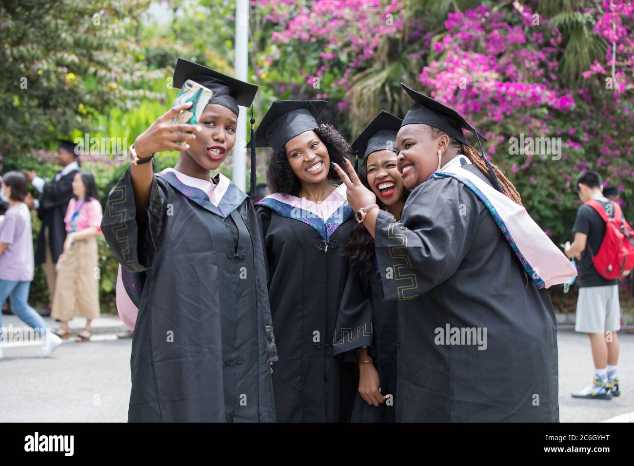 South African students pose for graduation photos at the Chongqing ...
