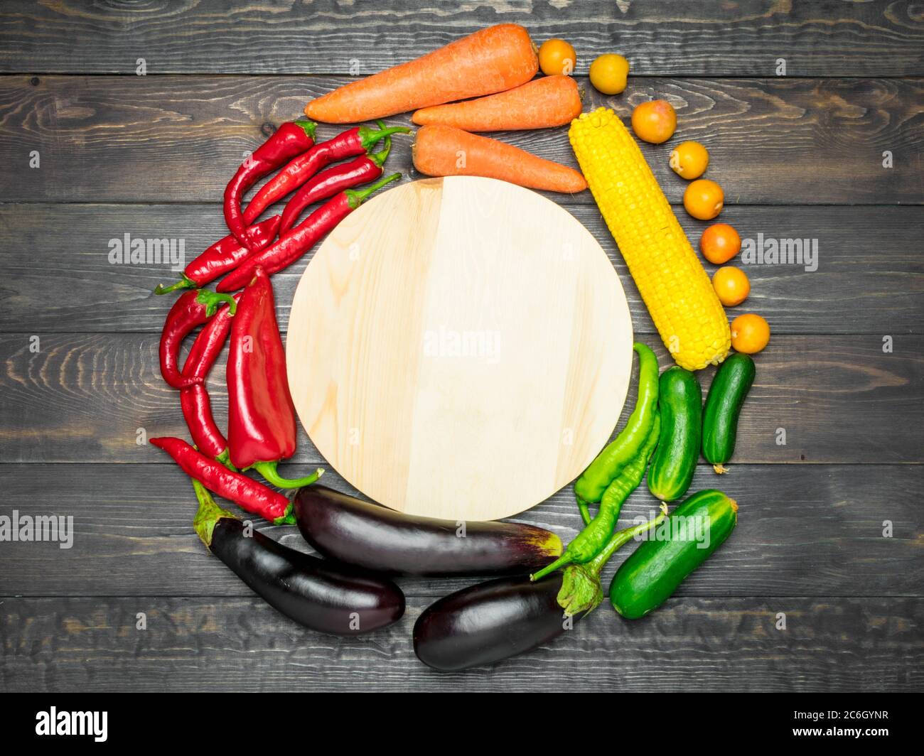 tabletop arrangement of a variety of fresh fruits and vegetables sorted ...
