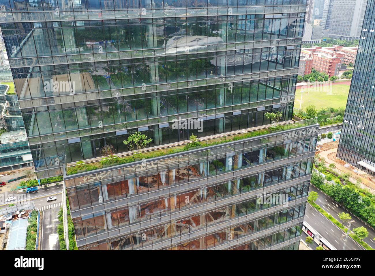 Aerial view of a glass-box-like office building in Nanning city, south ...