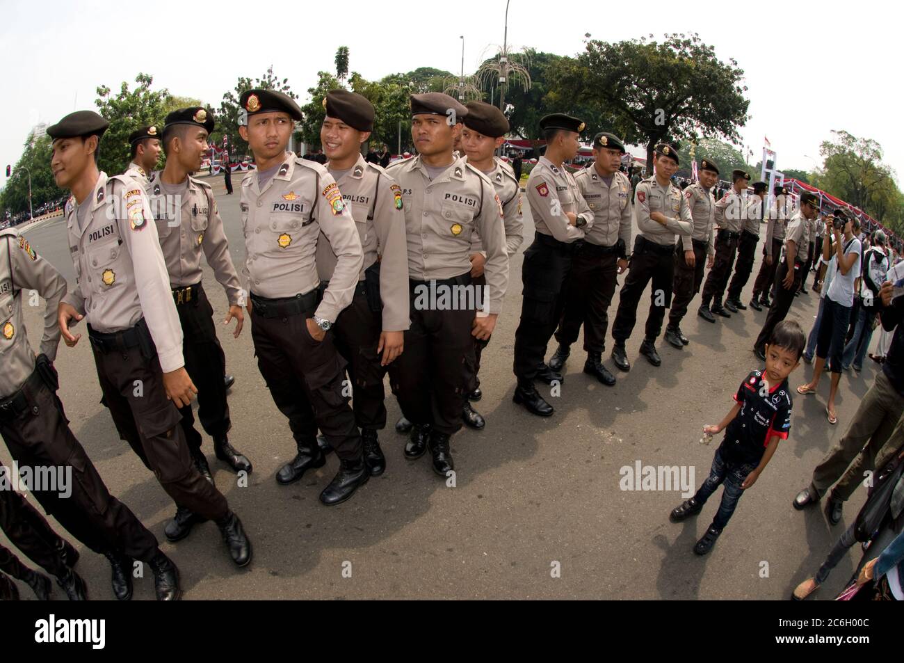 Police in line in front of crowds, 17th August 2009 National Day Hari ...
