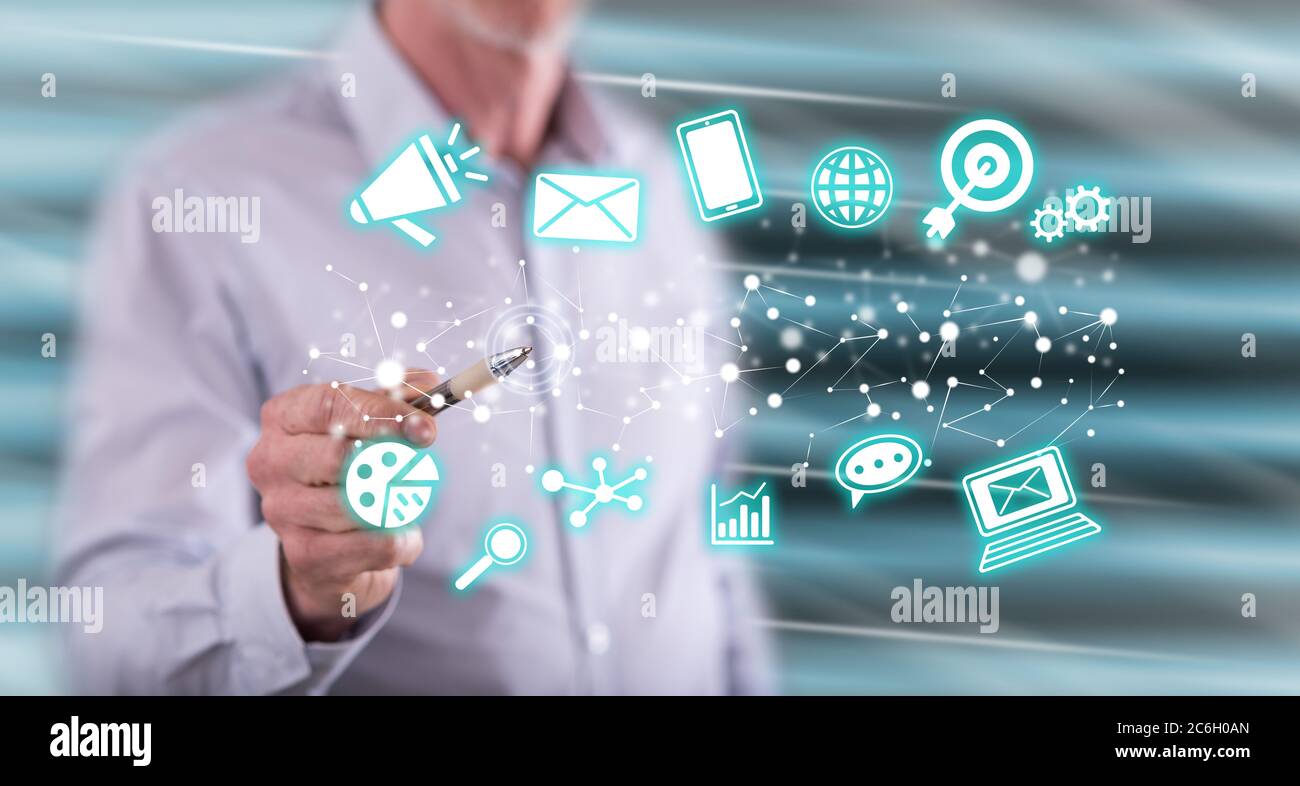 Man touching a digital marketing concept on a touch screen with a pen ...