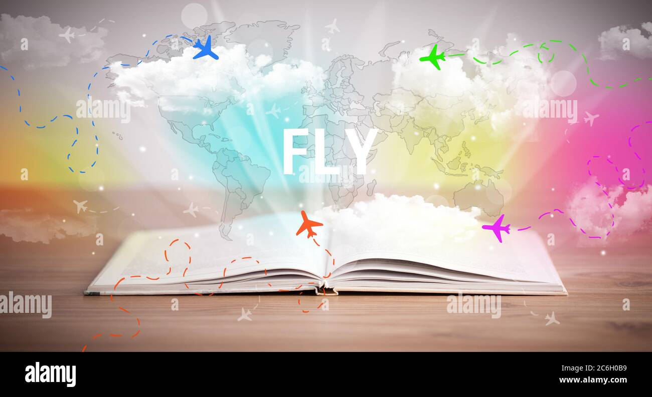 Open book with FLY inscription, vacation concept Stock Photo - Alamy