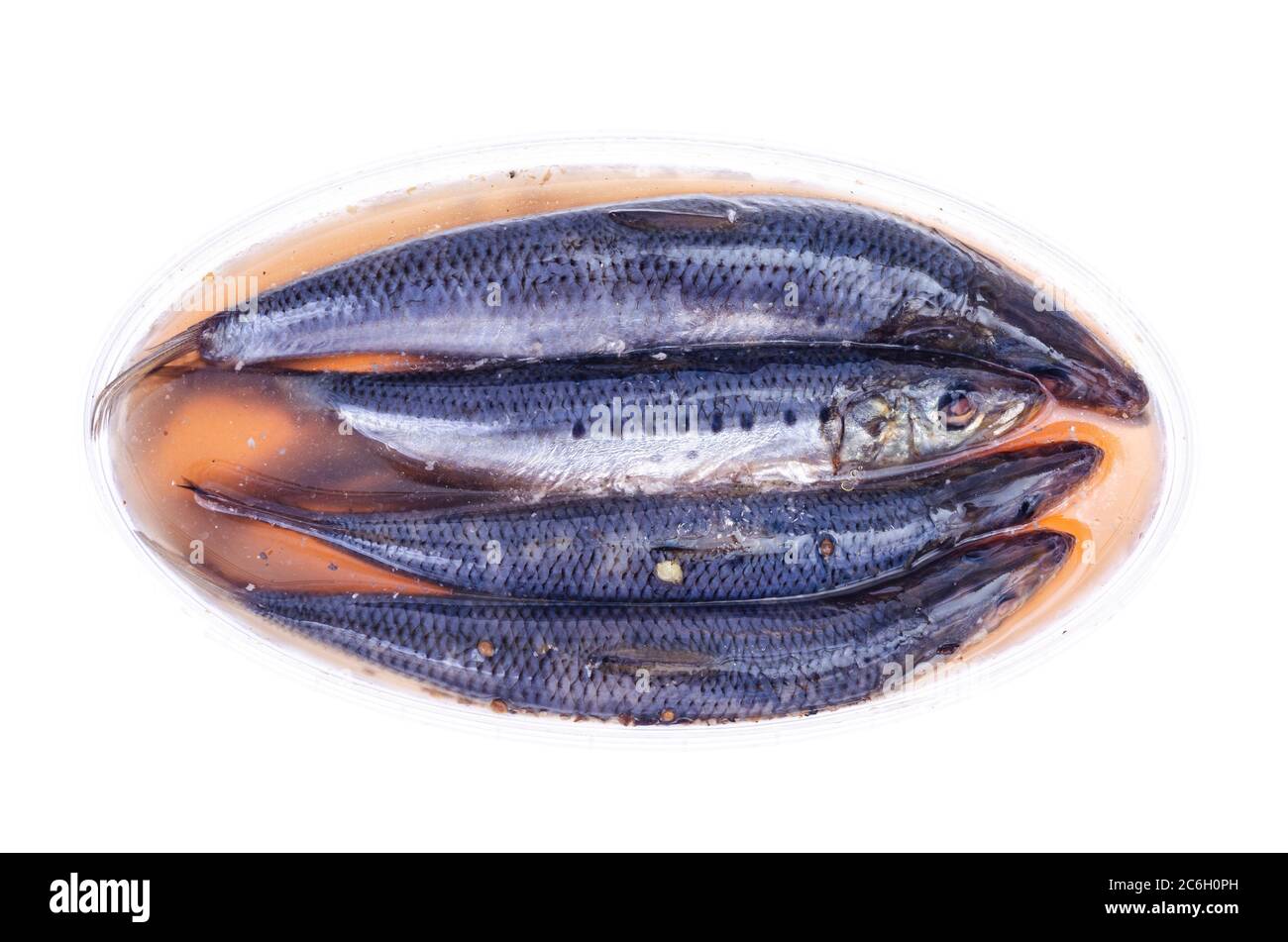 Pickled salted fish, herring in plastic. Photo Stock Photo - Alamy