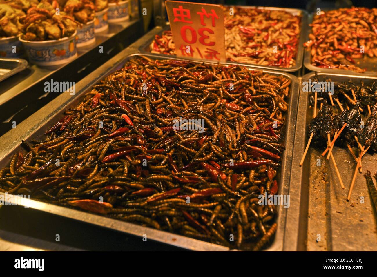 Deep fried insects are sold at a night market in Nanning city, south ...