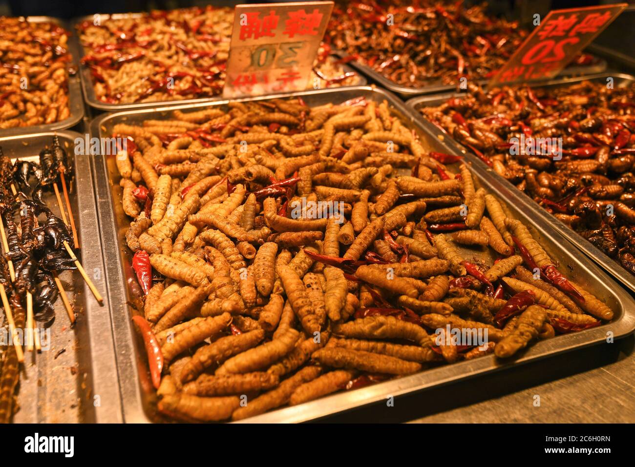 Deep fried insects are sold at a night market in Nanning city, south ...