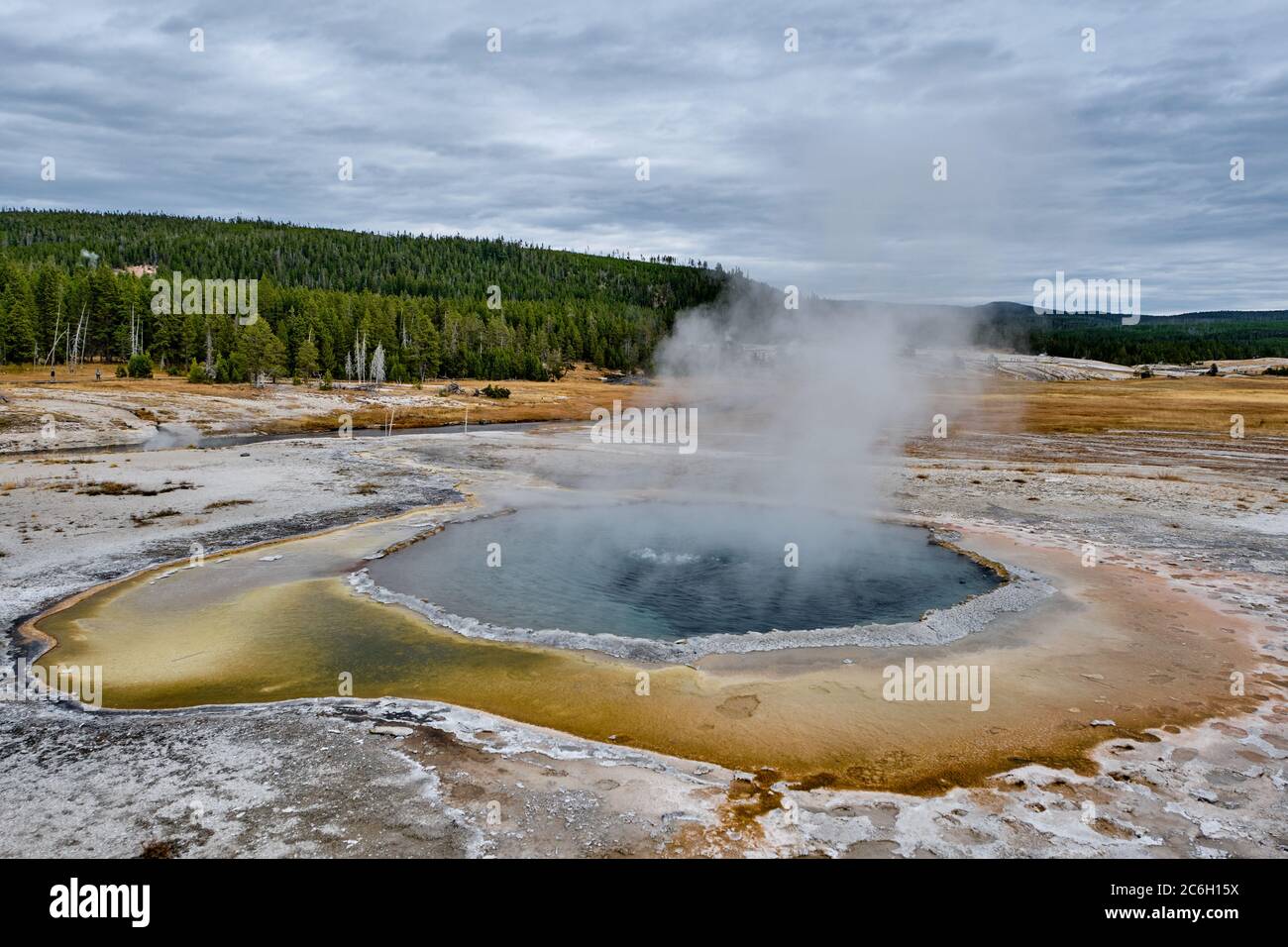 blue water hot spring in yellowstone national park Stock Photo - Alamy