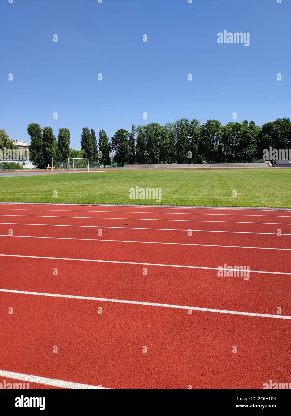 new running track and football field Stock Photo - Alamy