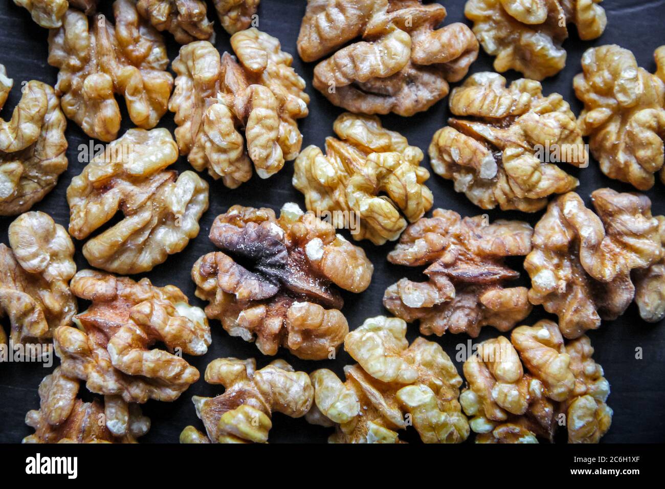 Walnut kernels background texture wallpaper. Closeup view Stock Photo ...