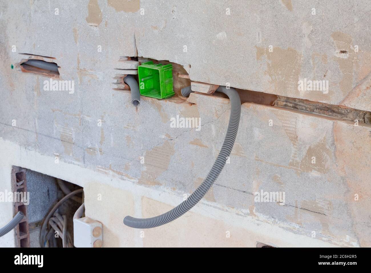 Electricity work in the wall of an house in construction Stock Photo ...