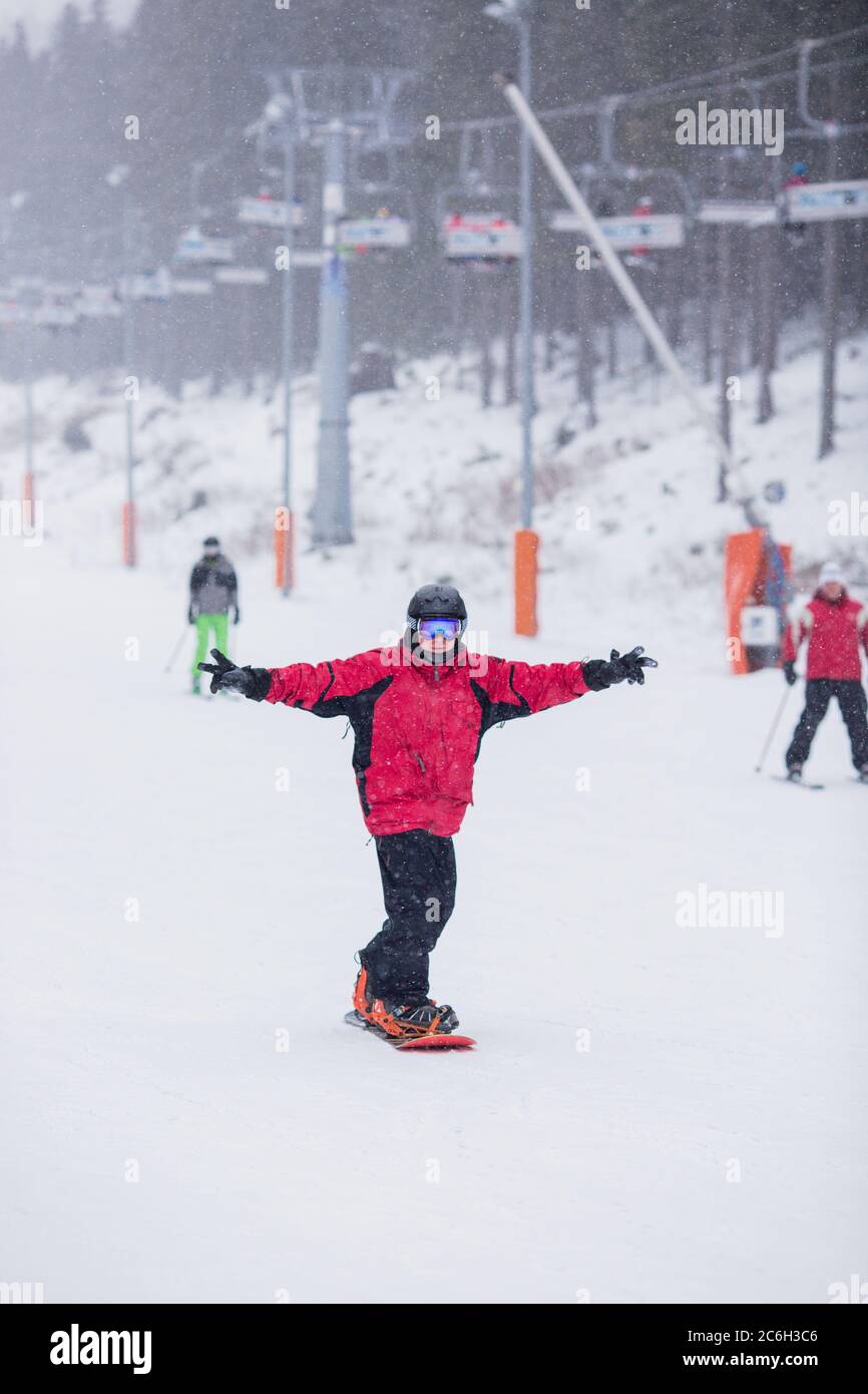 Sliding down snow slope hi-res stock photography and images - Alamy
