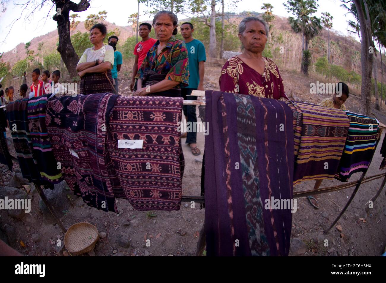 Women selling Ikat fabrics, Lewaling Village, Lembata Island, east of ...