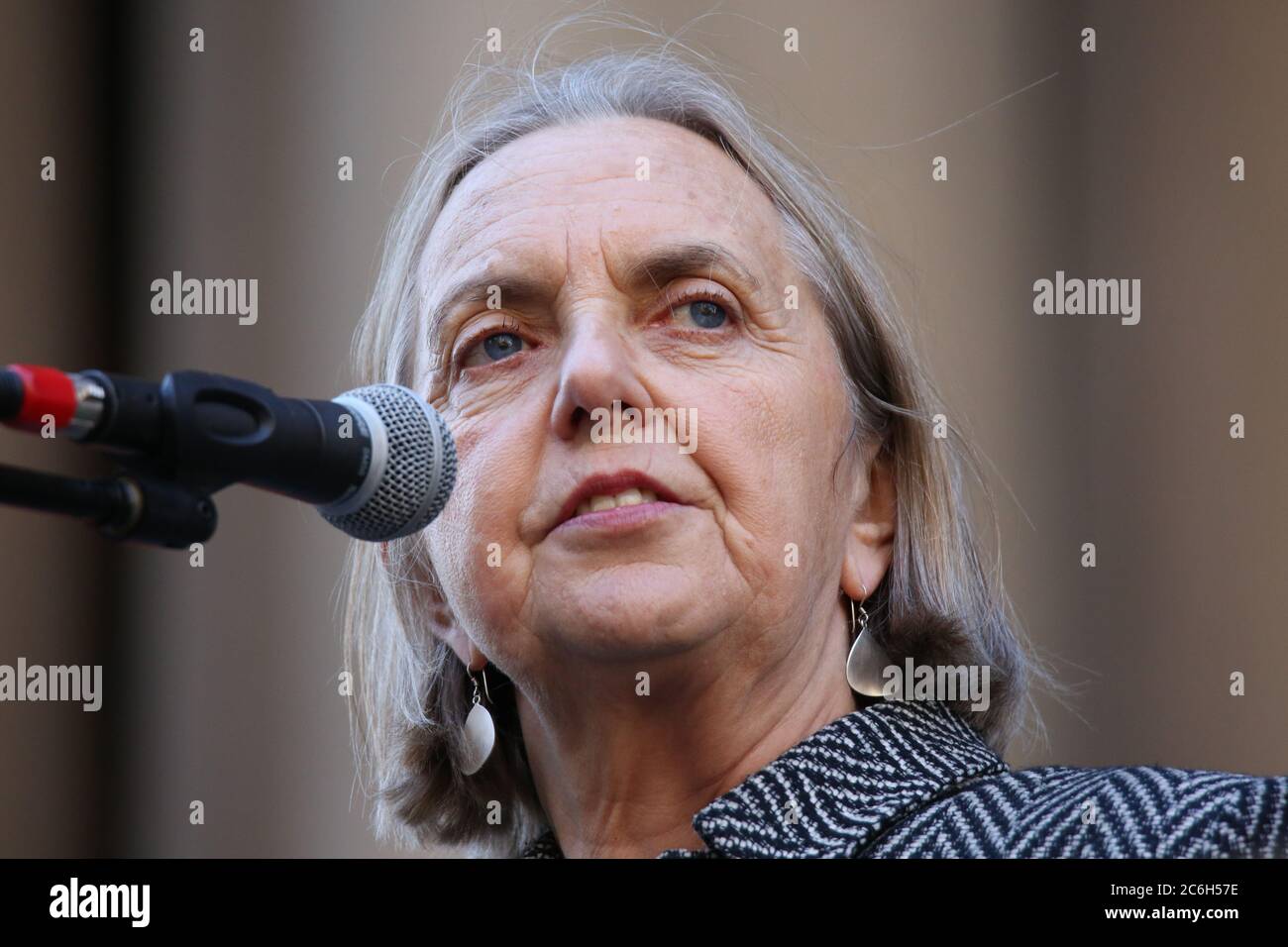 Greens senator Lee Rhiannon speaks from the steps of Sydney Town Hall ...