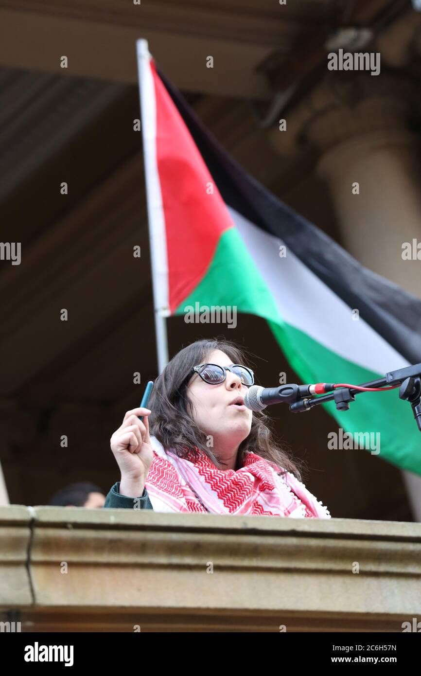 Miss Hassan speaks from the steps of Sydney Town Hall at the rally in ...