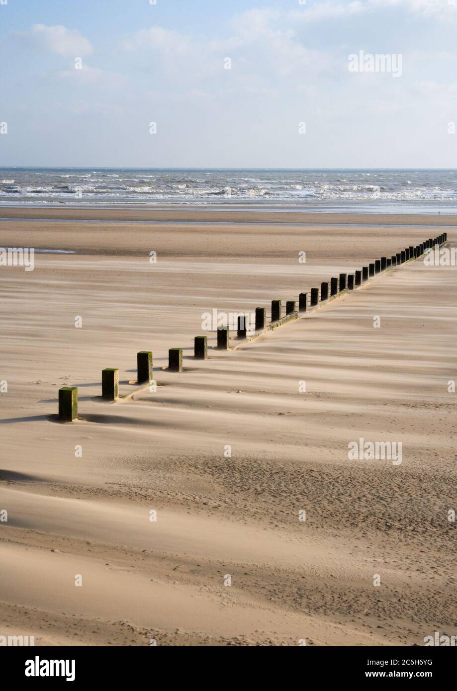 sand and groynes at dymchurch on the kent coast Stock Photo - Alamy