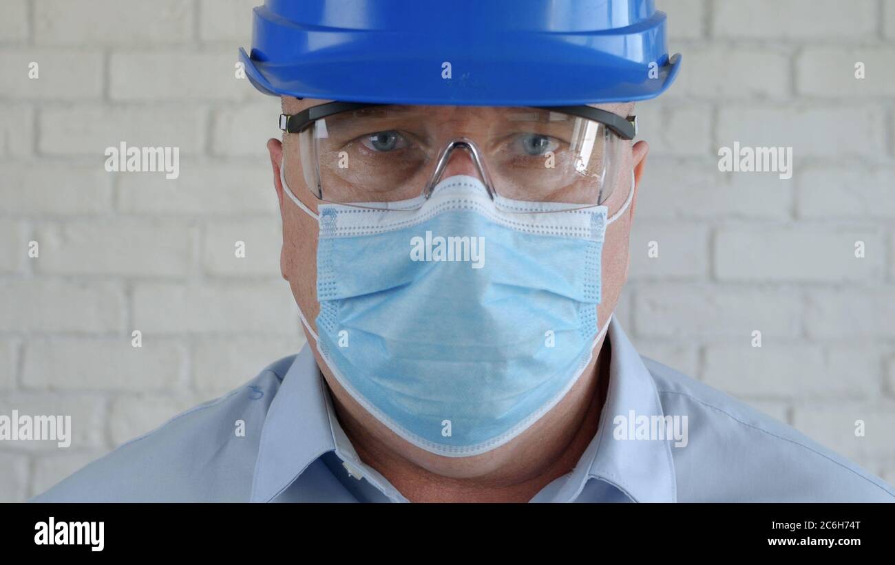 Confident Image with an Engineer Wearing Face Protection Mask Against ...