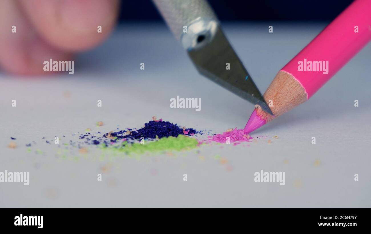 Elderly Person Sharpen a Colored Pencil Using a Sharp Little Knife ...