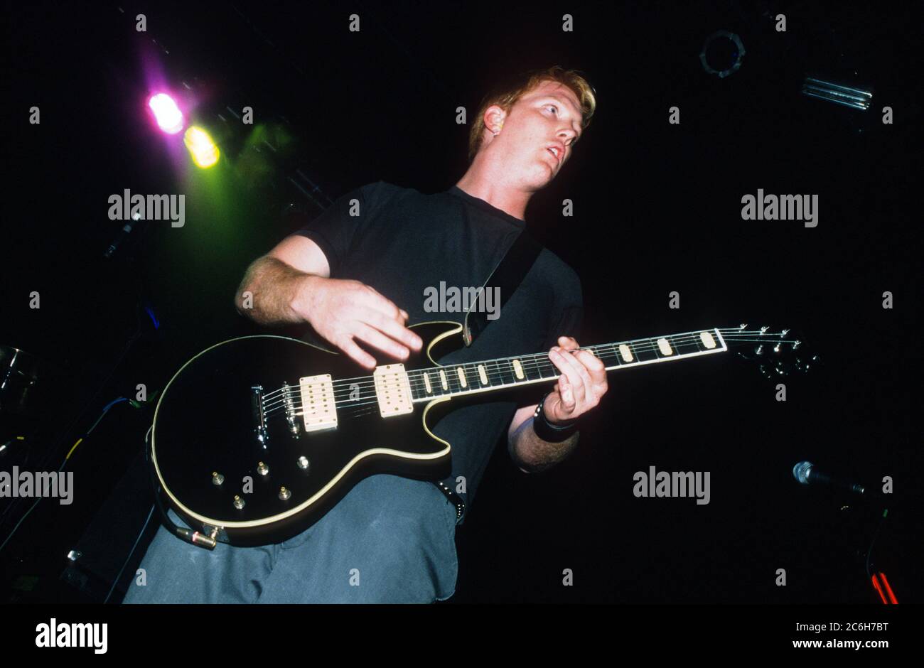 Josh Homme in Queens of the Stoneage performing at The Garage 28/08 ...