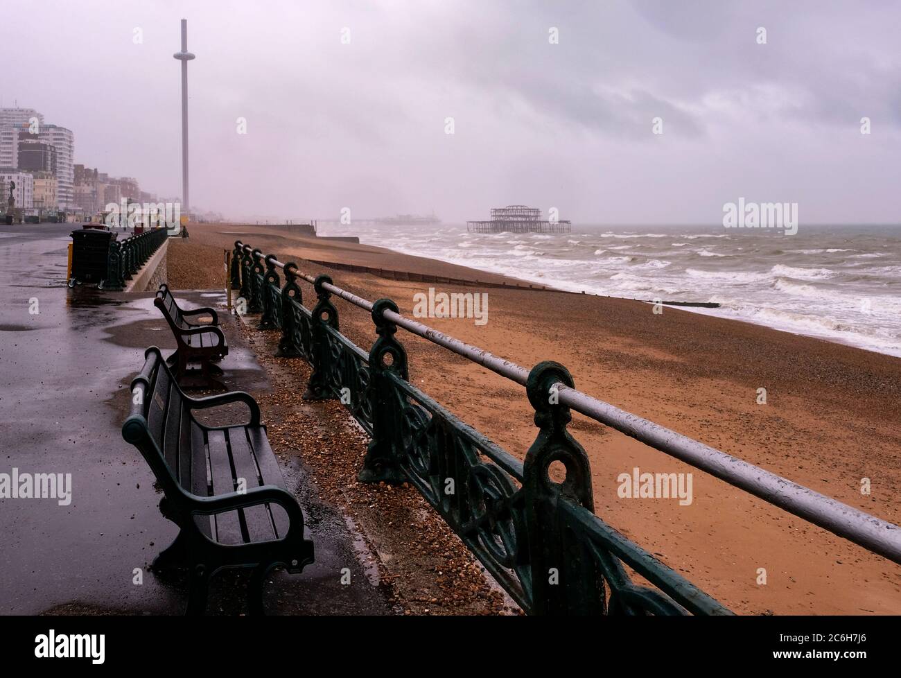 An empty, wet, Brighton seafront on a stormy day Stock Photo - Alamy