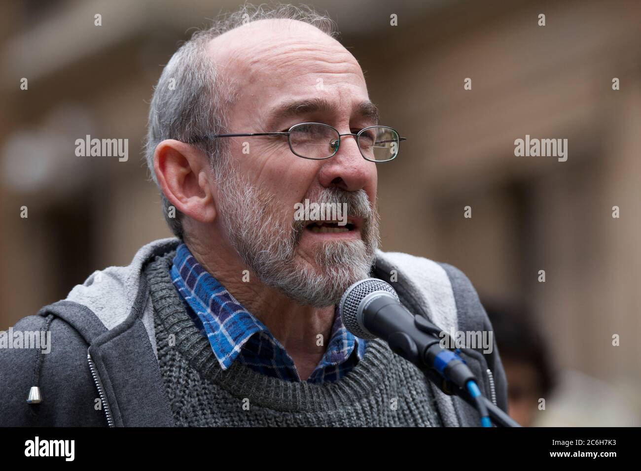 Ian Rintoul of Refugee Action Coalition speaks at the rally in support ...