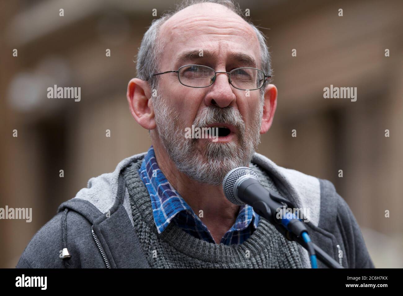 Ian Rintoul of Refugee Action Coalition speaks at the rally in support ...