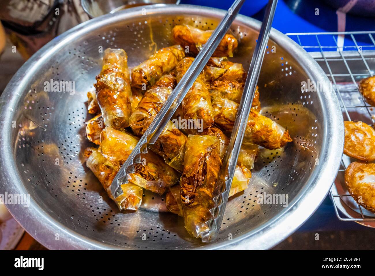 Fried spring rolls, night market, central Vientiane, Laos Stock Photo ...