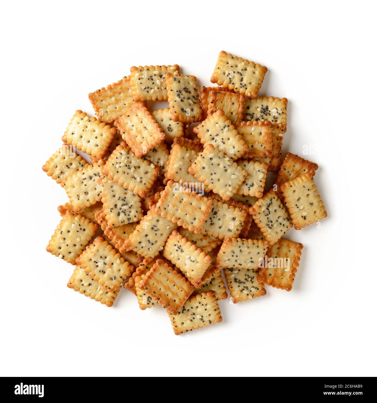 Pile of small salty rectangular crackers with poppy and sesame seeds ...