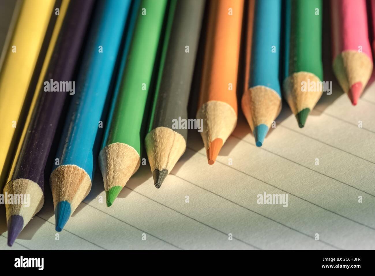 Shallow focus view of a close-up image of new colouring pencils seen on ...