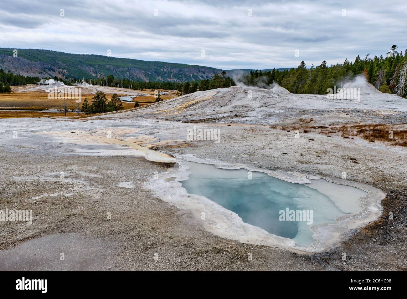 blue water hot spring in yellowstone national park Stock Photo - Alamy