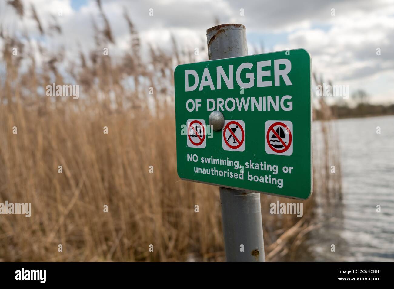 Detailed view of a Danger of Drowning sign see positioned near a large ...