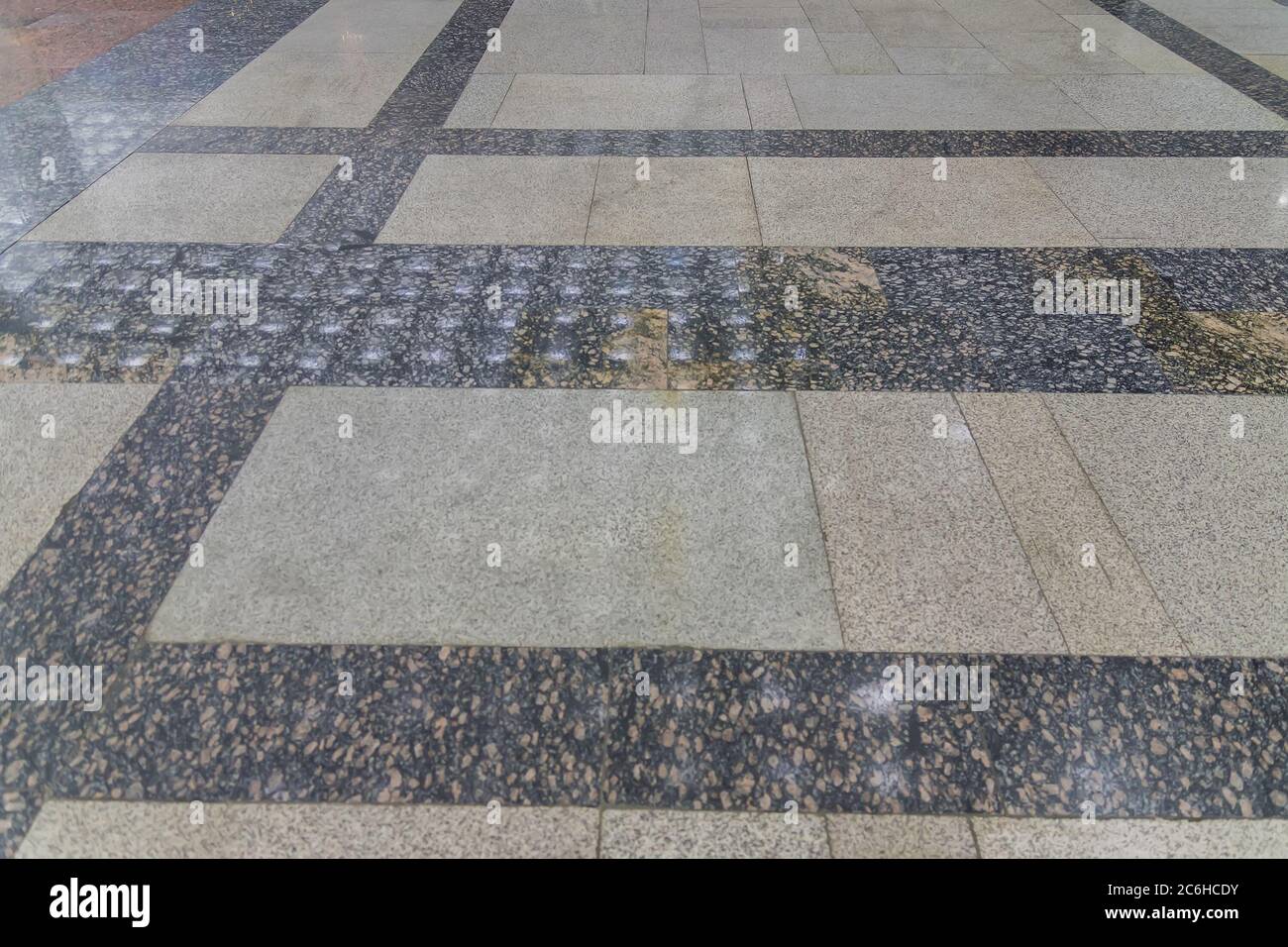 granite floor with a reflection of the ceiling. Seamless texture ...