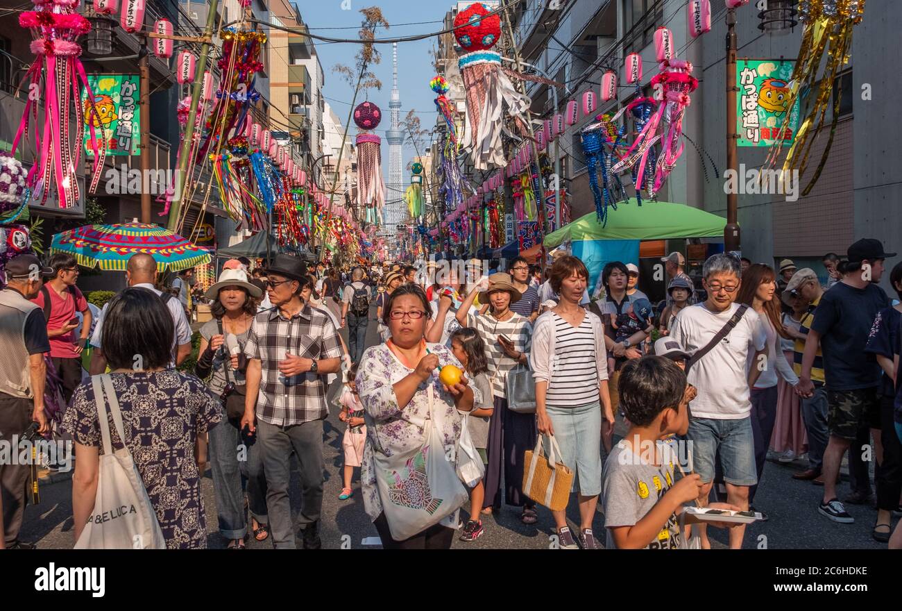 Crowd of people at Shitamachi Tanabata Matsuri festival in the street ...