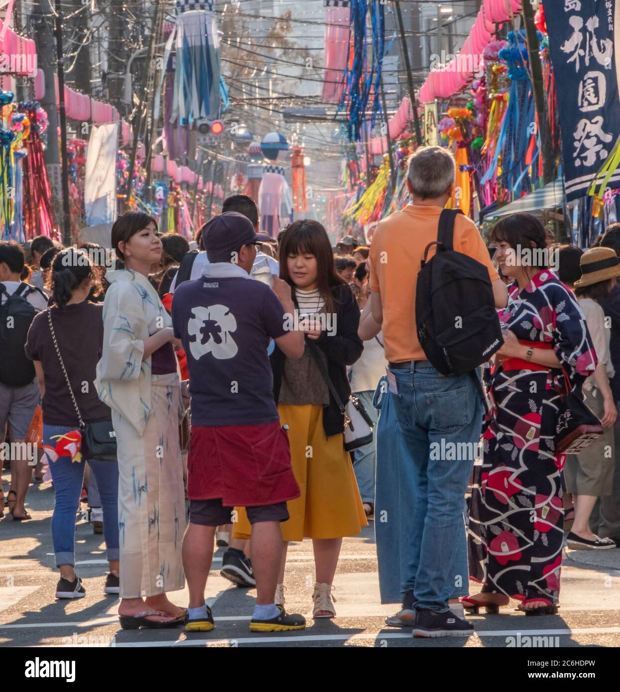 Crowd of people at Shitamachi Tanabata Matsuri festival in the street ...
