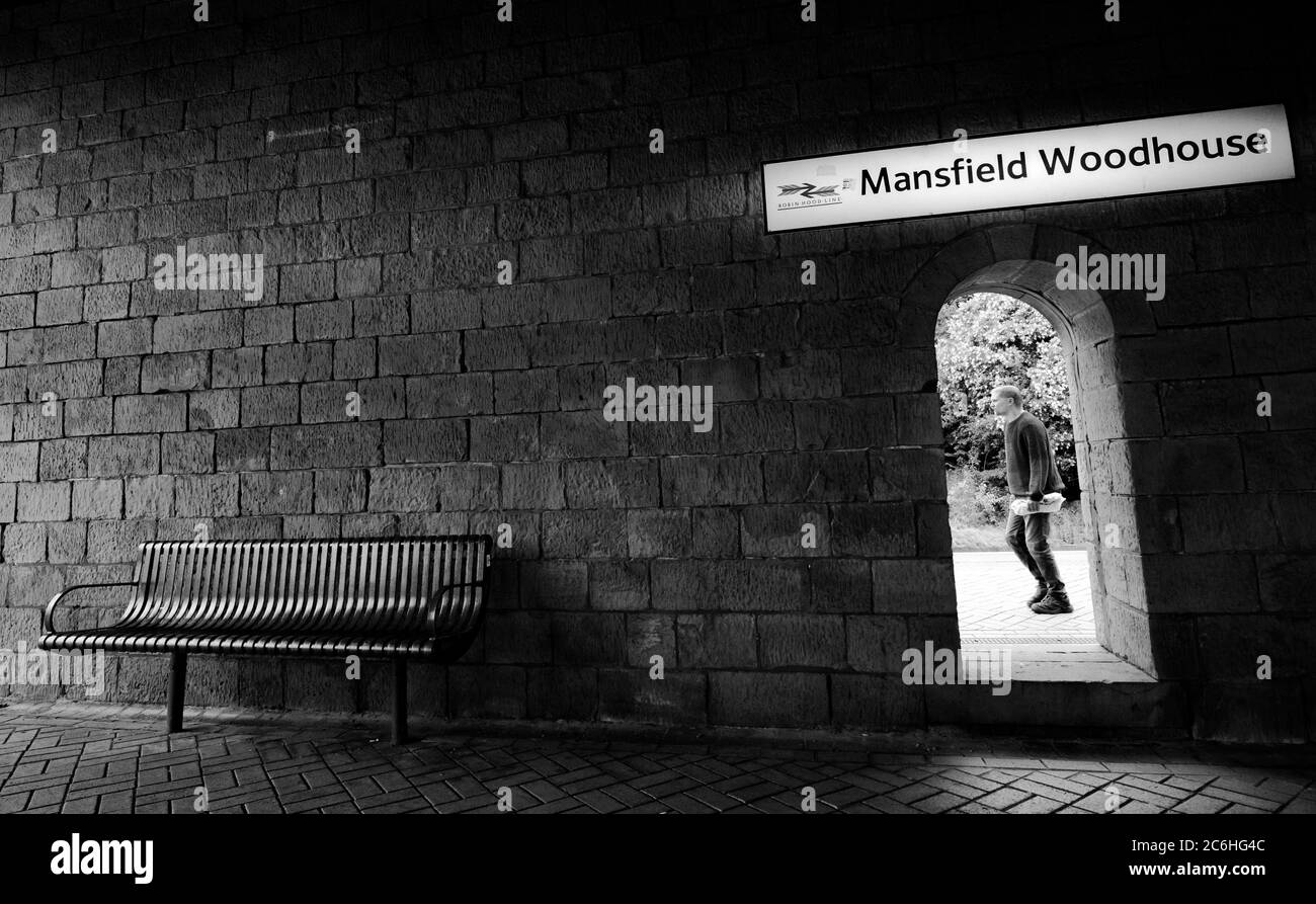 Sign and seating at the stone built railway station, Mansfield ...