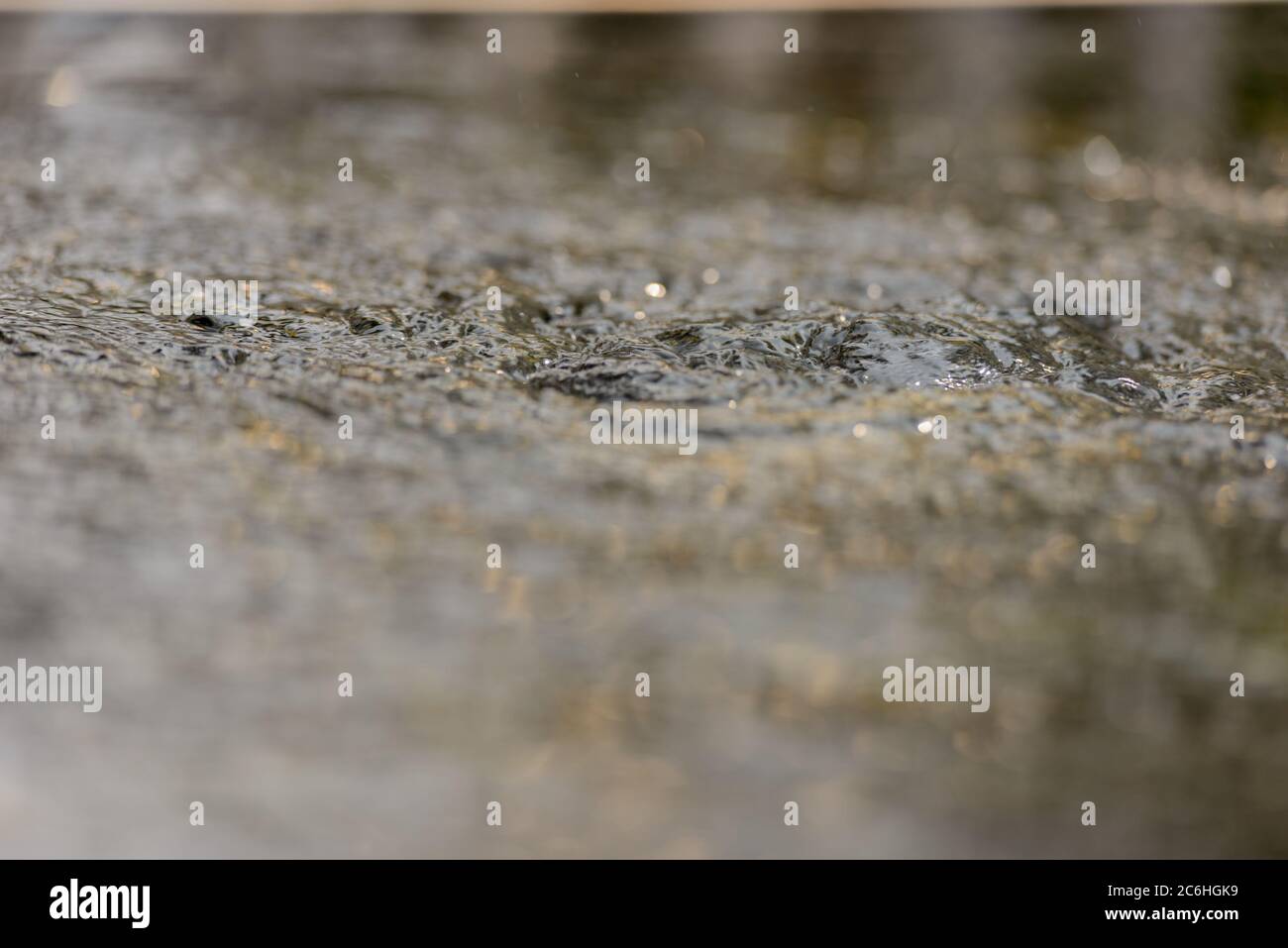 Portrait of bubbling water in nature outdoors Stock Photo - Alamy