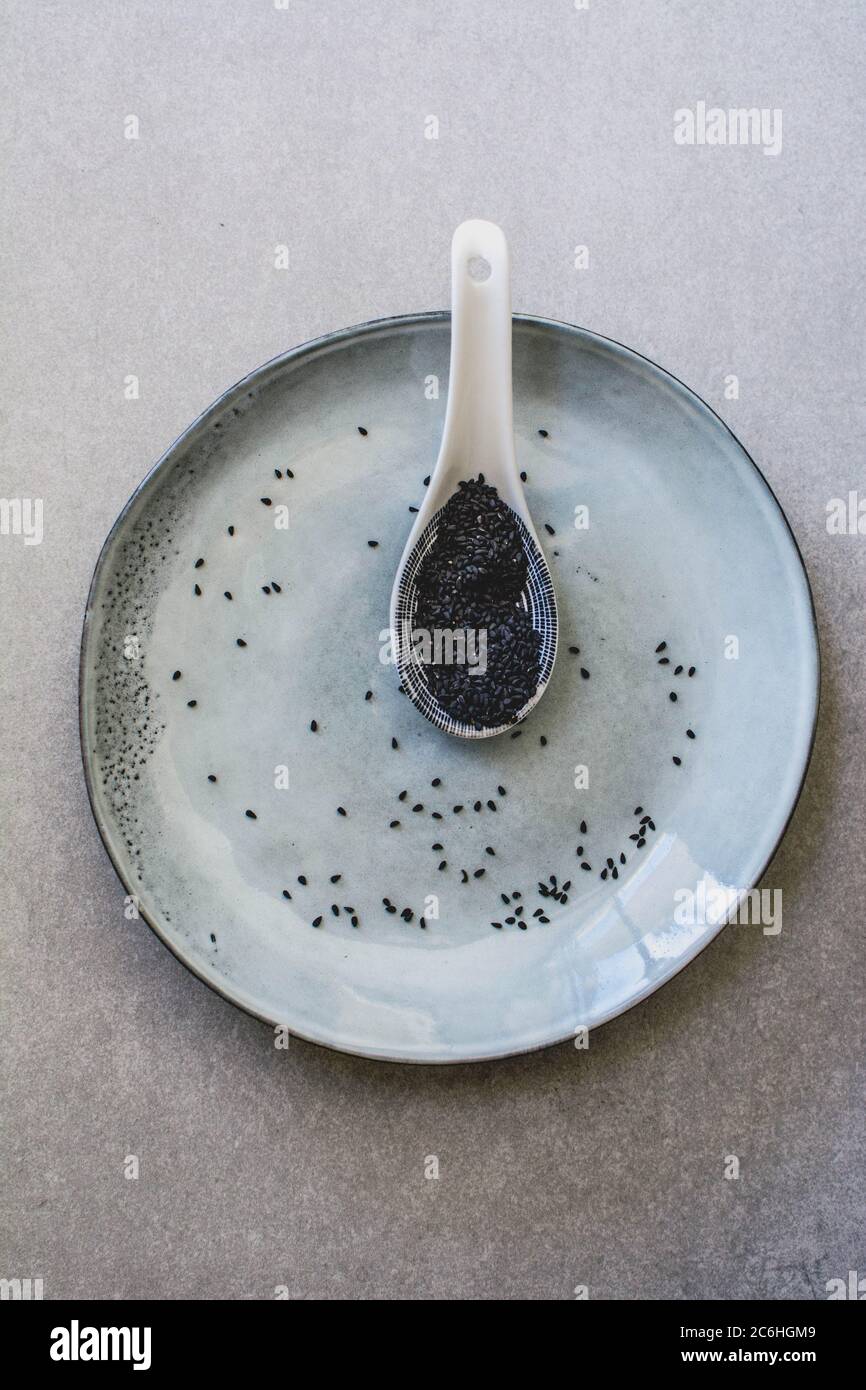 Beautiful stylish grey plate composition Stock Photo - Alamy