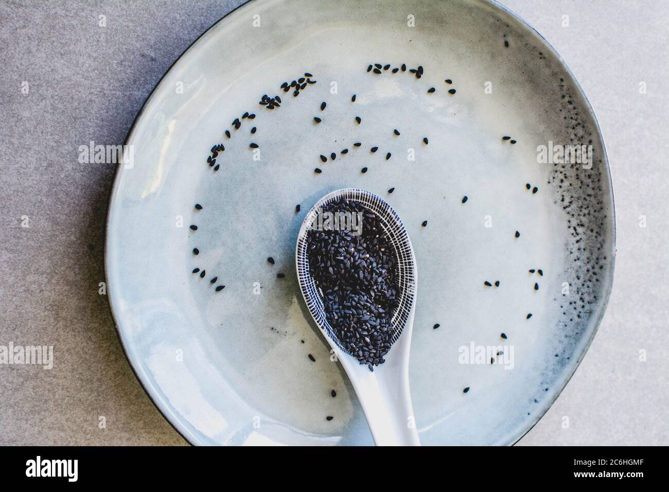 Beautiful stylish grey plate composition Stock Photo - Alamy