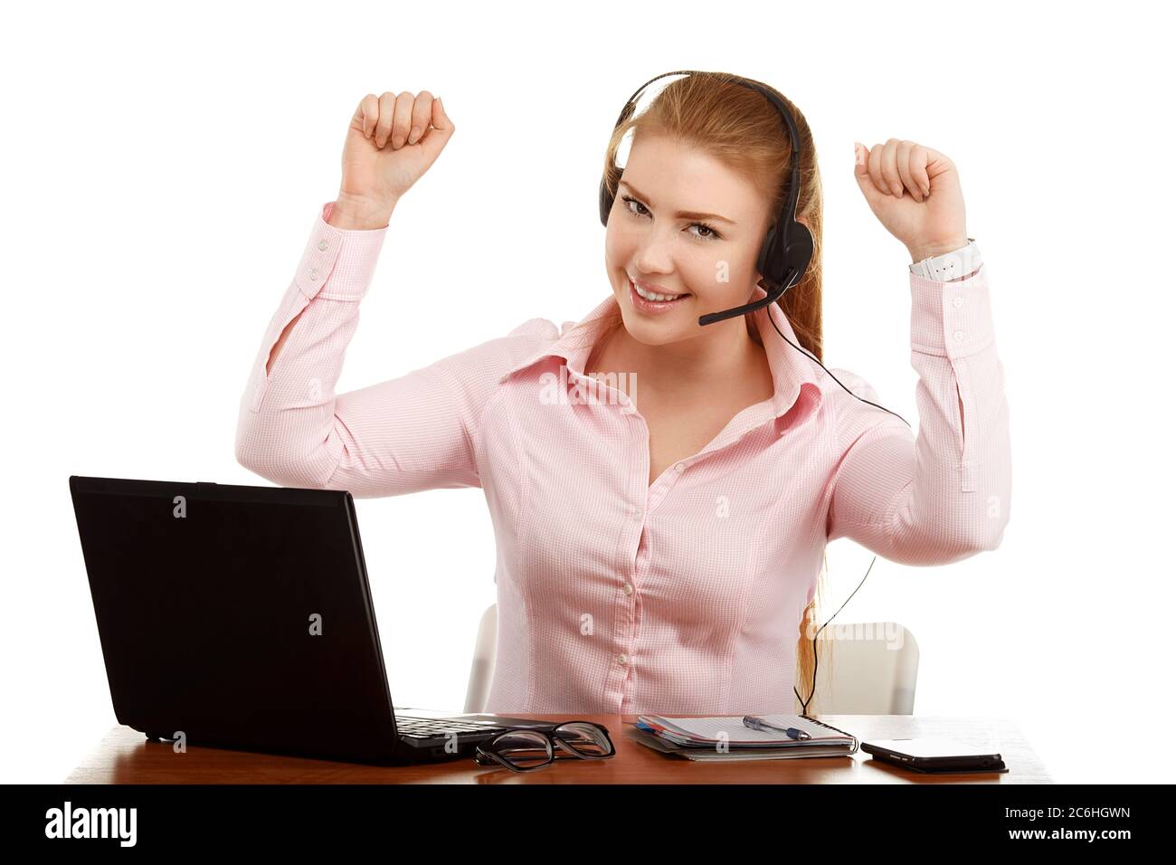 Portrait of office worker at a desk with a computer isolated on white ...