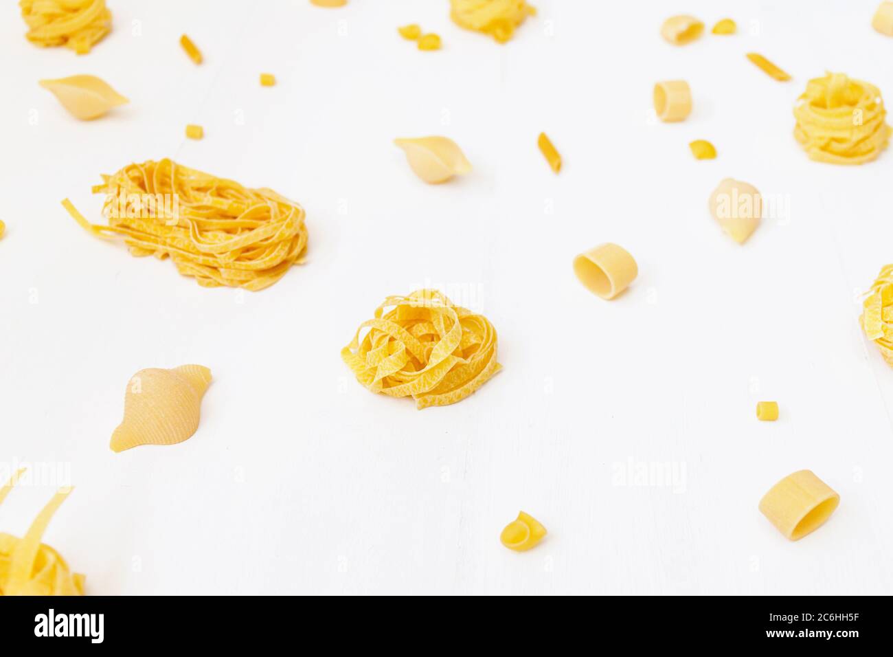 Background or wallpaper made with italian pasta Stock Photo - Alamy