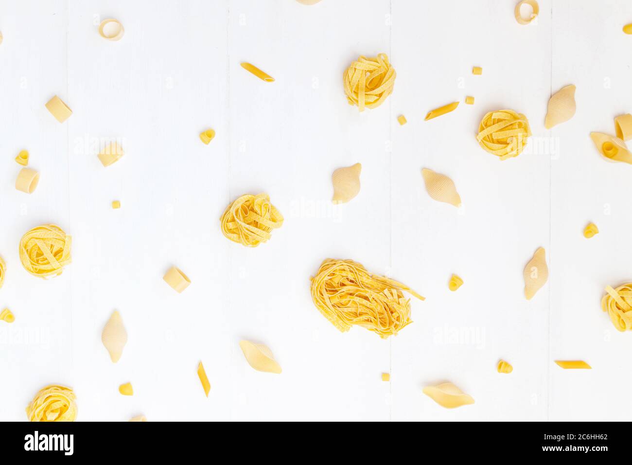 Background or wallpaper made with italian pasta Stock Photo - Alamy